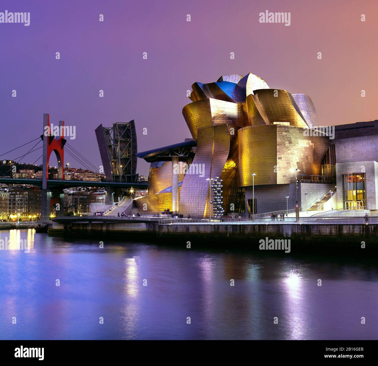Night view of Guggenheim museum over the Nervion river estuary. Bilbao ...