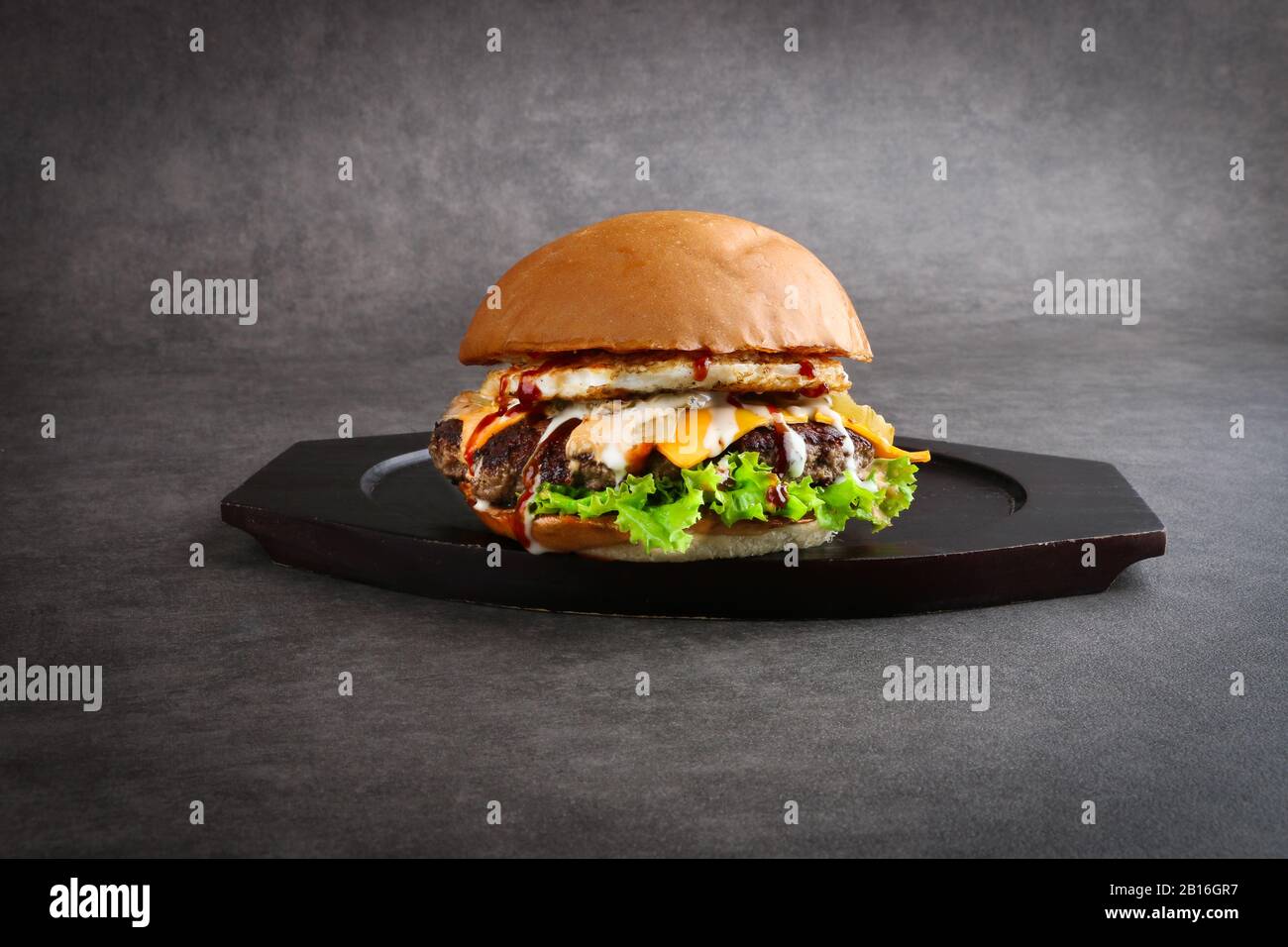 Beef burger - Classic cheese burger with beef patty, pickles, cheese ...