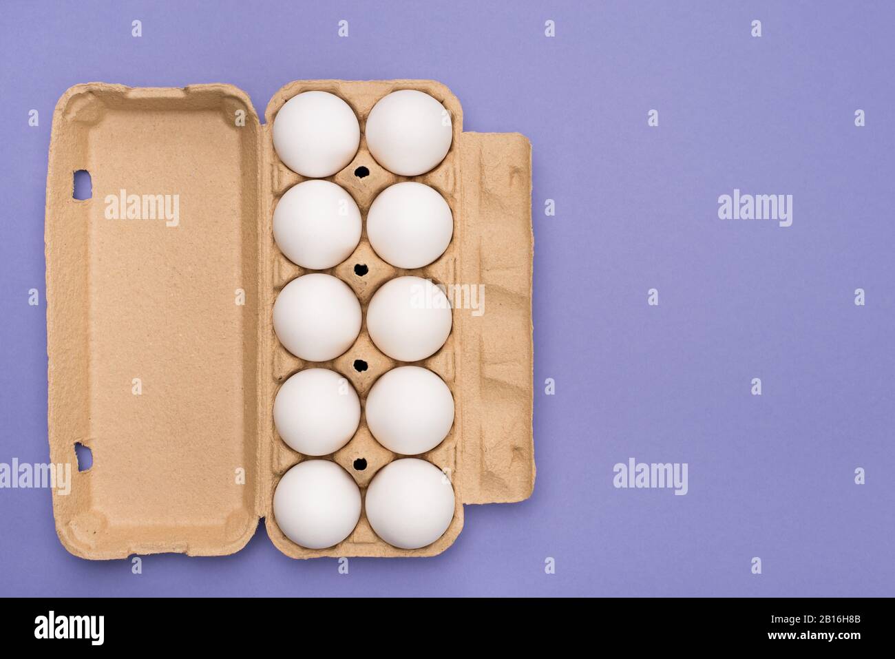 Above top overhead close up view photo of carton container with ten ...