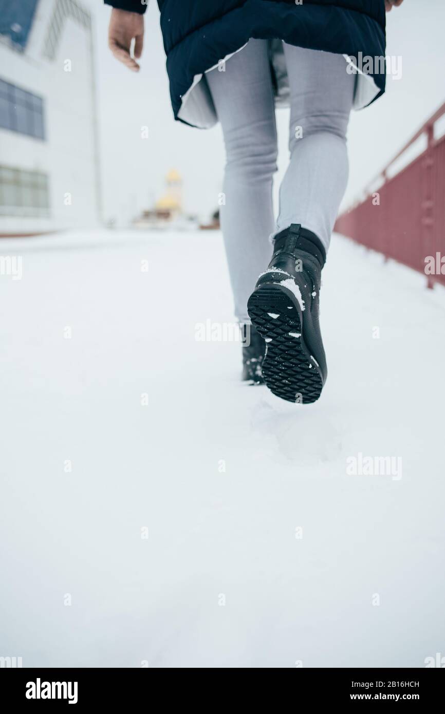 Female boots legs rear hi-res stock photography and images - Alamy