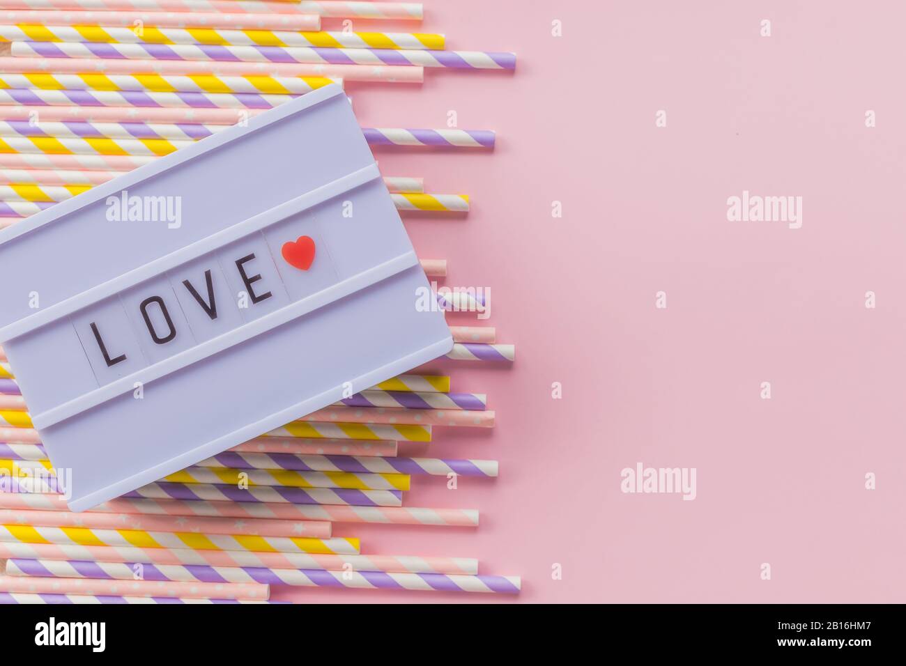 Happy Valentines Day light box message with red flower petals and ...