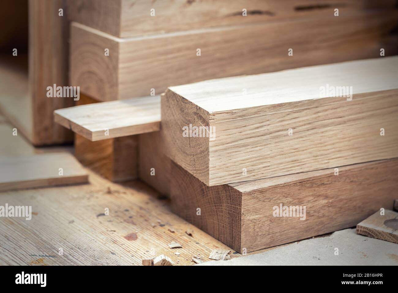 Oak wooden bar blocks materials stacked at carpentry woodwork workshop ...