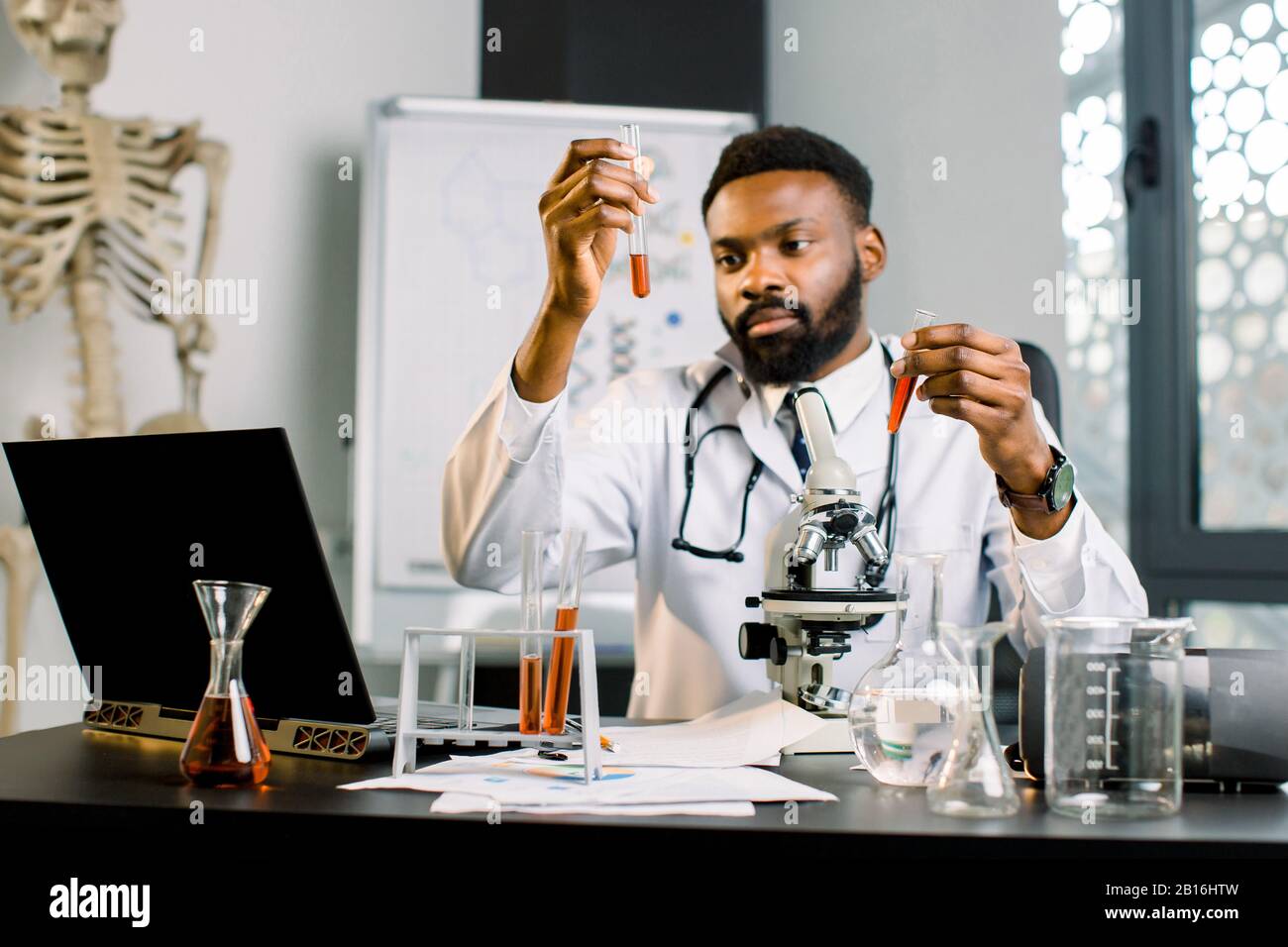 African american man scientist microbioigist chemist in white coat ...