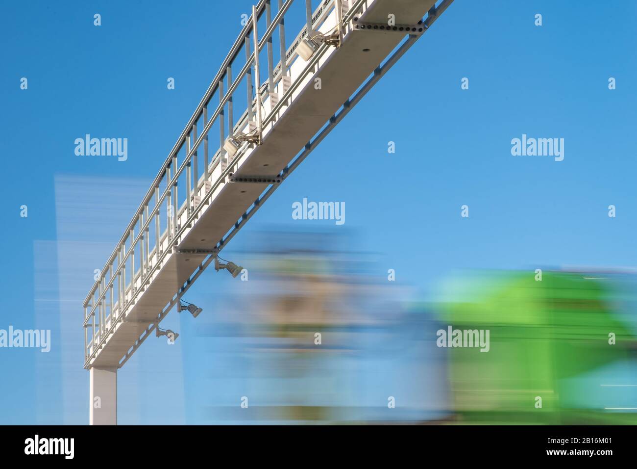 truck drive through the highway through the toll gate, toll charges ...