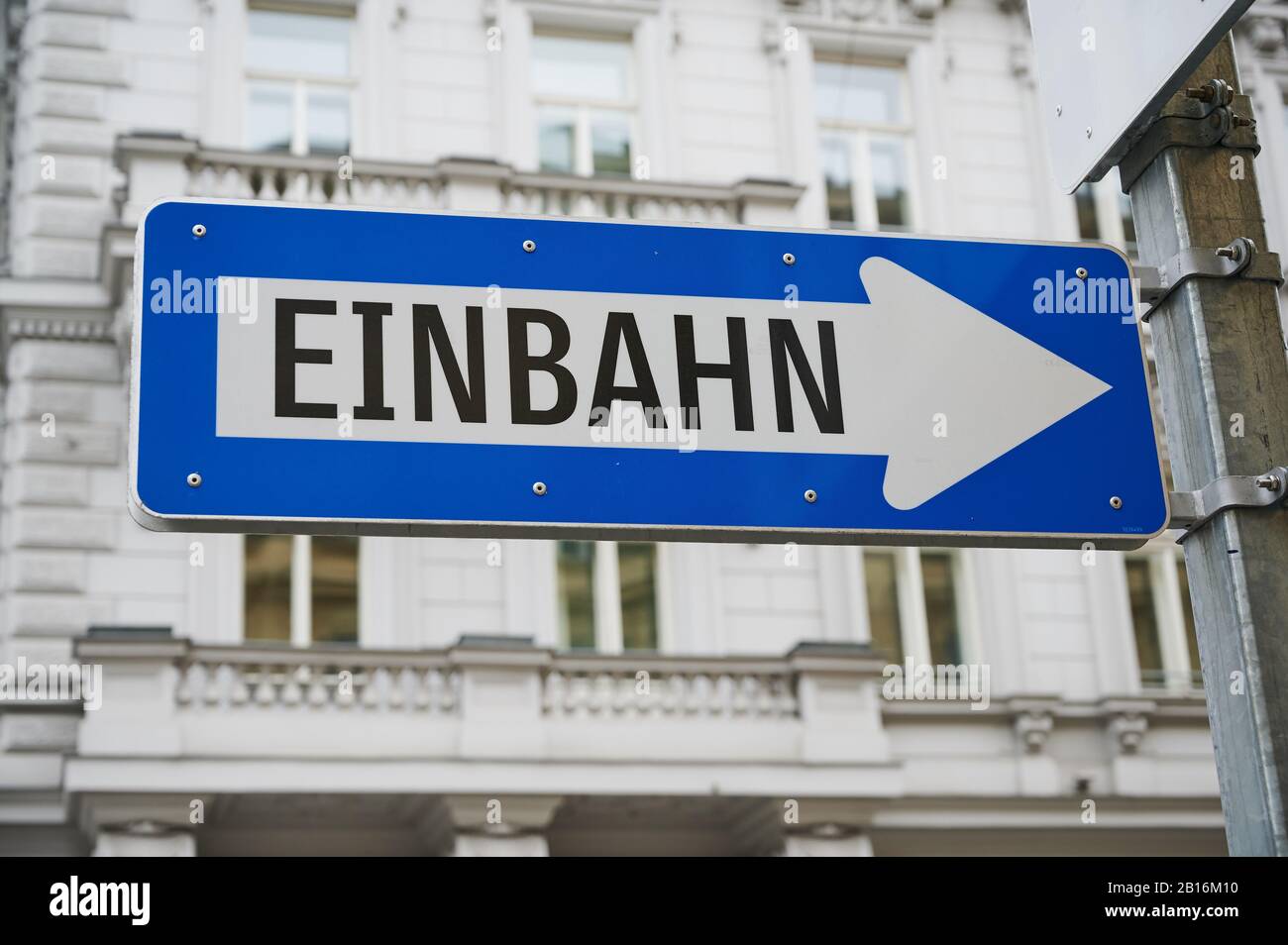 blue street sign in Vienna, Austria with the German word for "oneway ...