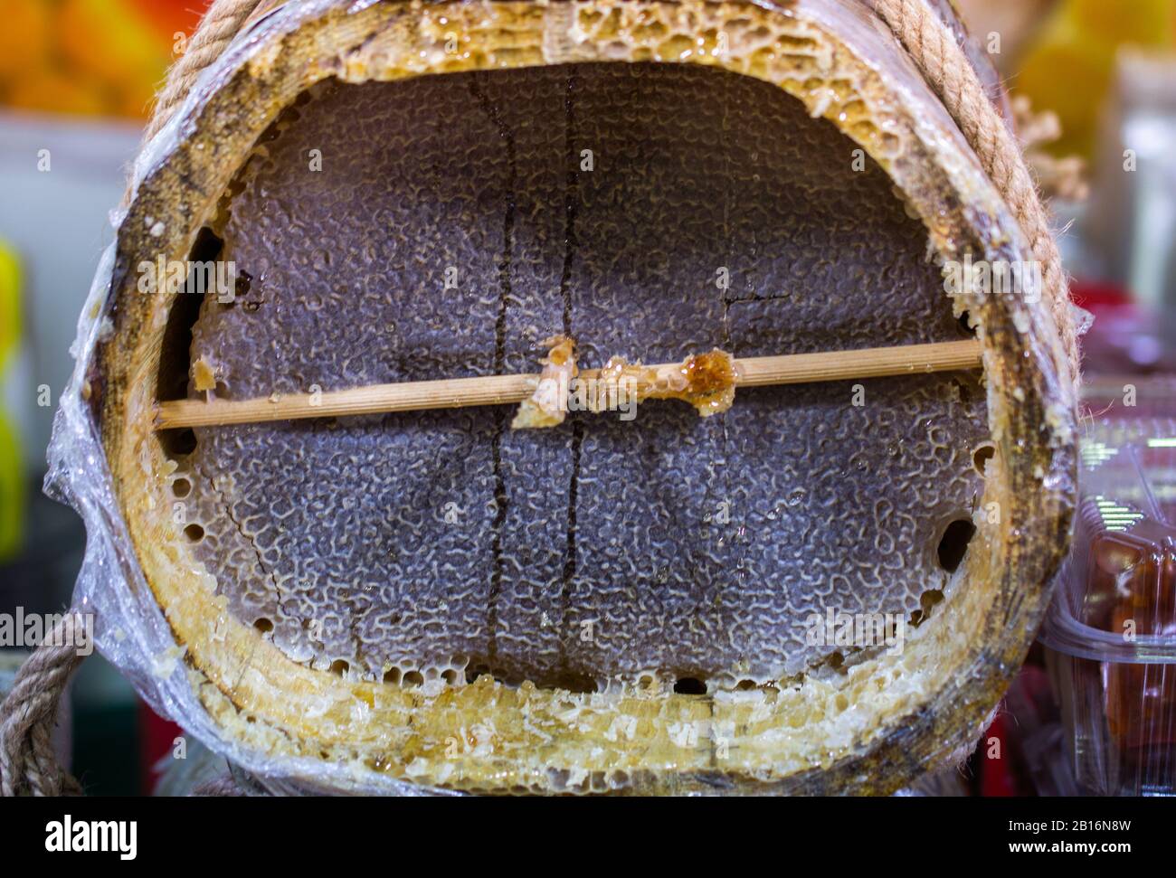 Honey in honeycomb from round beehive with sweet honey Stock Photo - Alamy