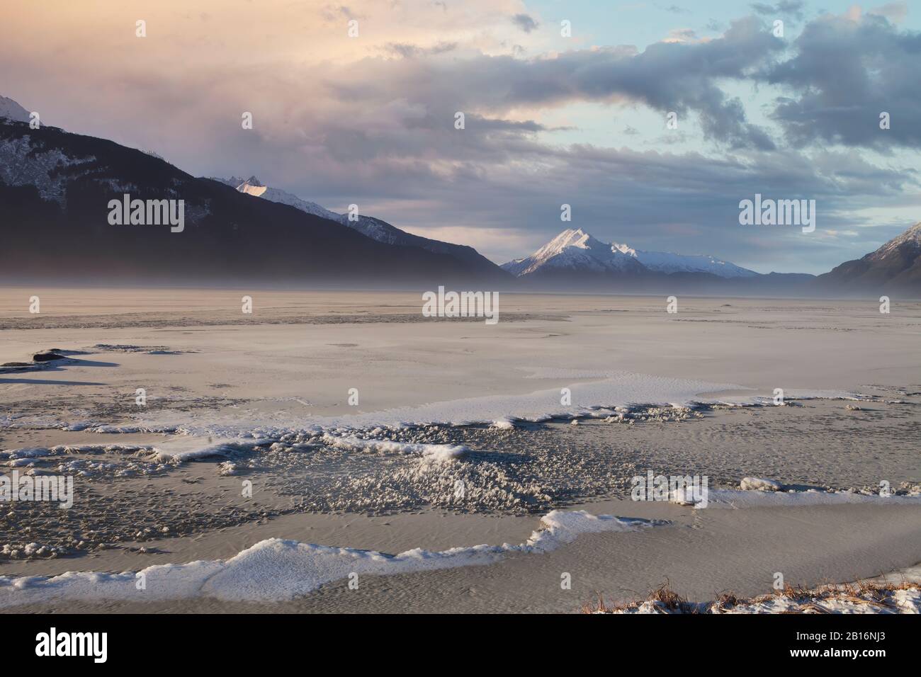 Sandy dry riverbed with mountains at sunset in Southeast Alaska Stock ...