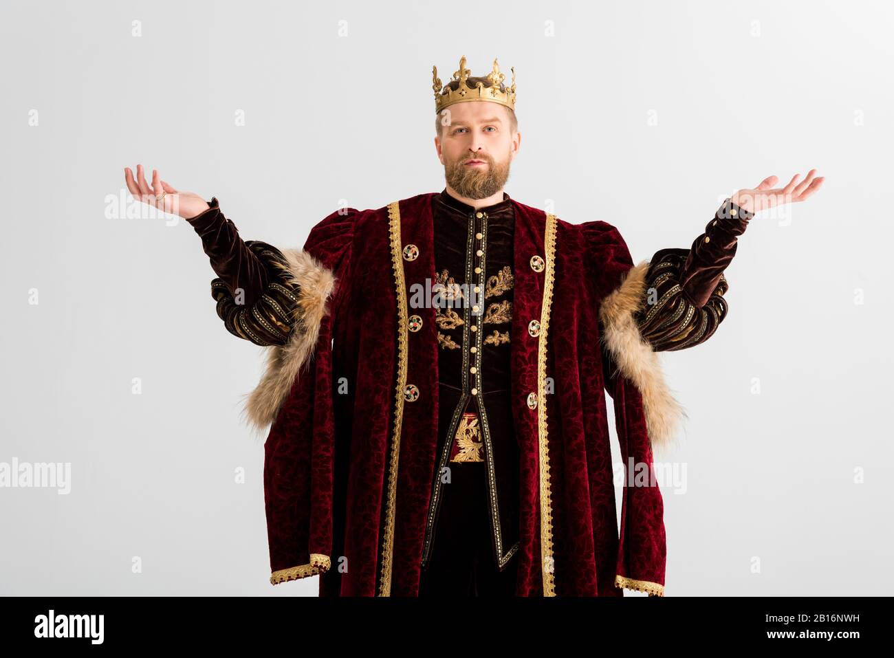 king with crown showing outstretched hands isolated on grey Stock Photo ...