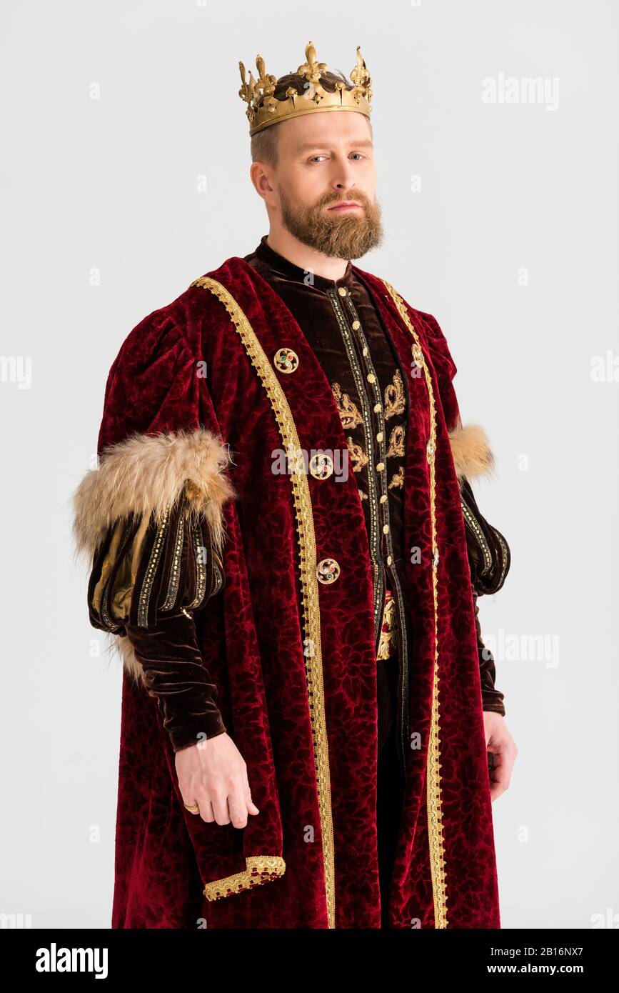 handsome king with crown looking at camera isolated on grey Stock Photo ...