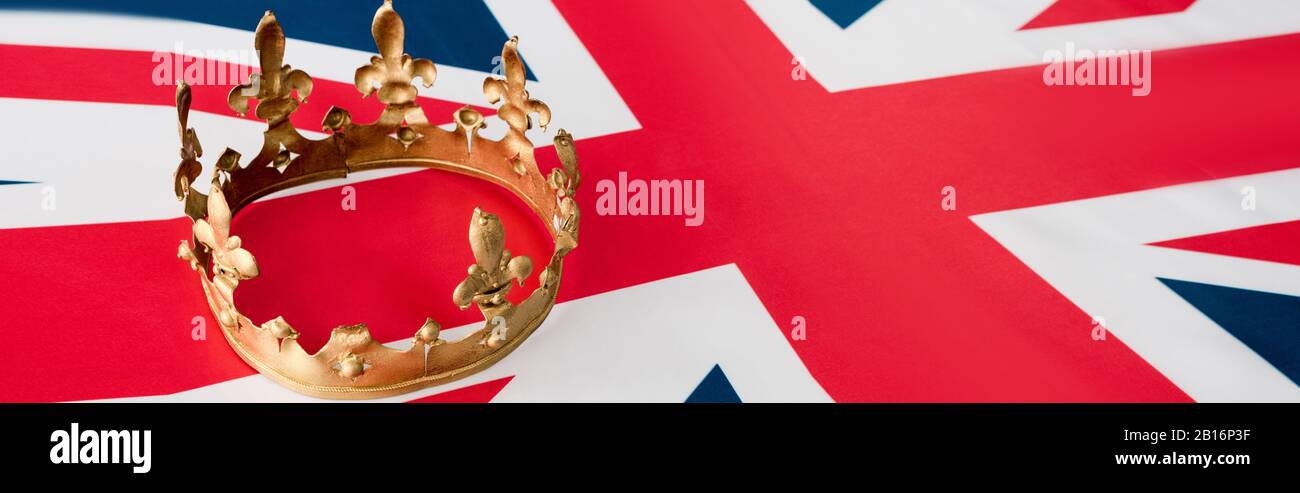 panoramic shot of golden crown on british flag Stock Photo - Alamy