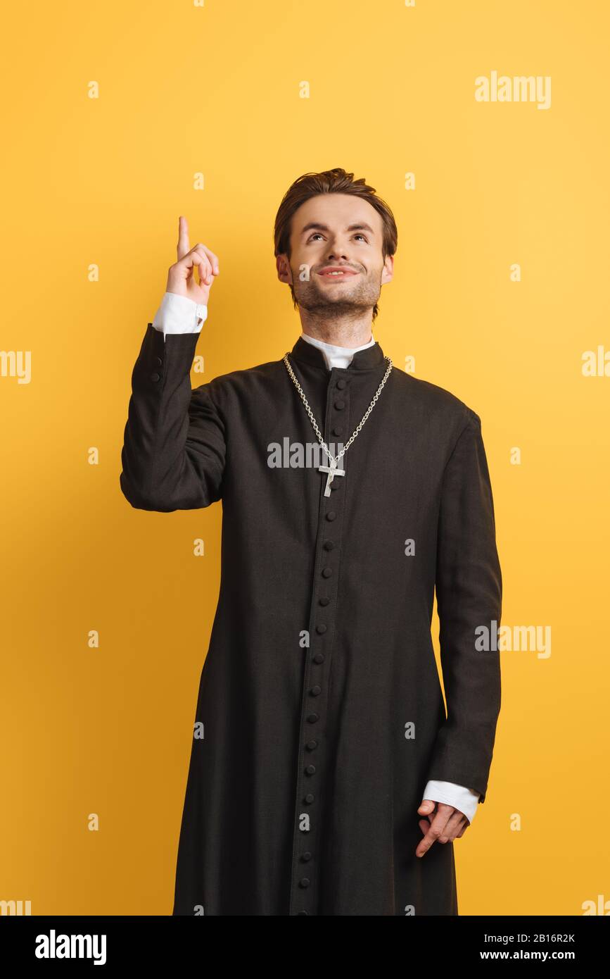 Priest looking up isolated hi-res stock photography and images - Alamy