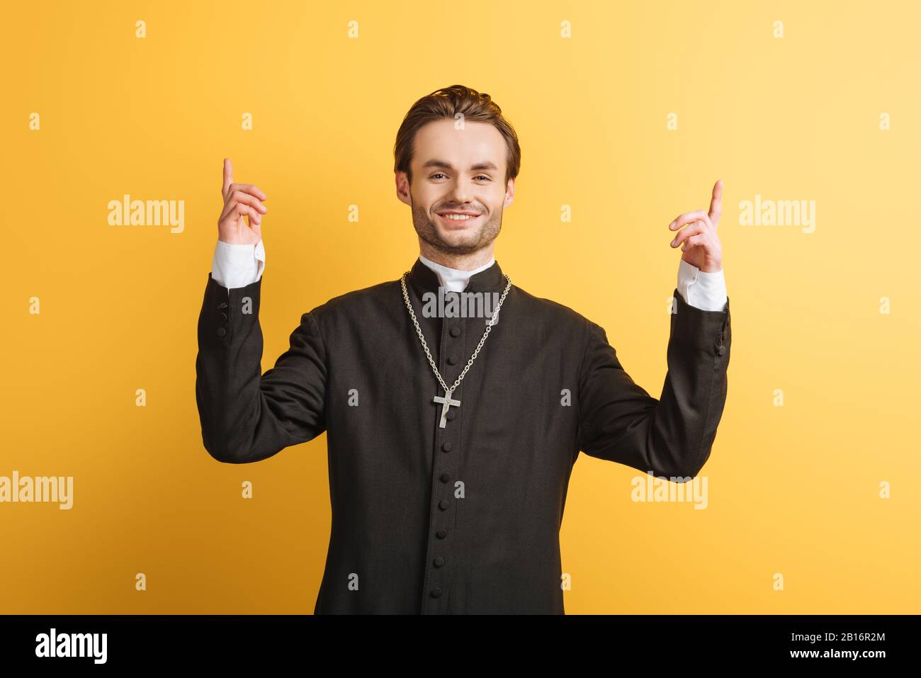 Priest looking up isolated hi-res stock photography and images - Alamy