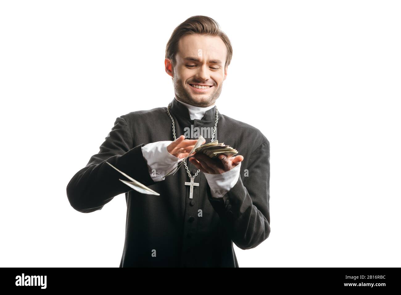 corrupt catholic priest smiling while counting money isolated on white ...