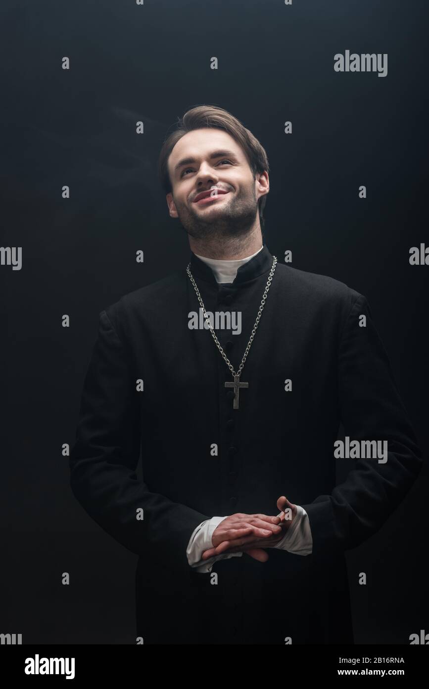 Priest looking up isolated hi-res stock photography and images - Alamy