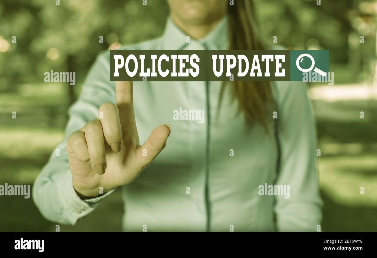 Writing note showing Policies Update. Business concept for act of ...