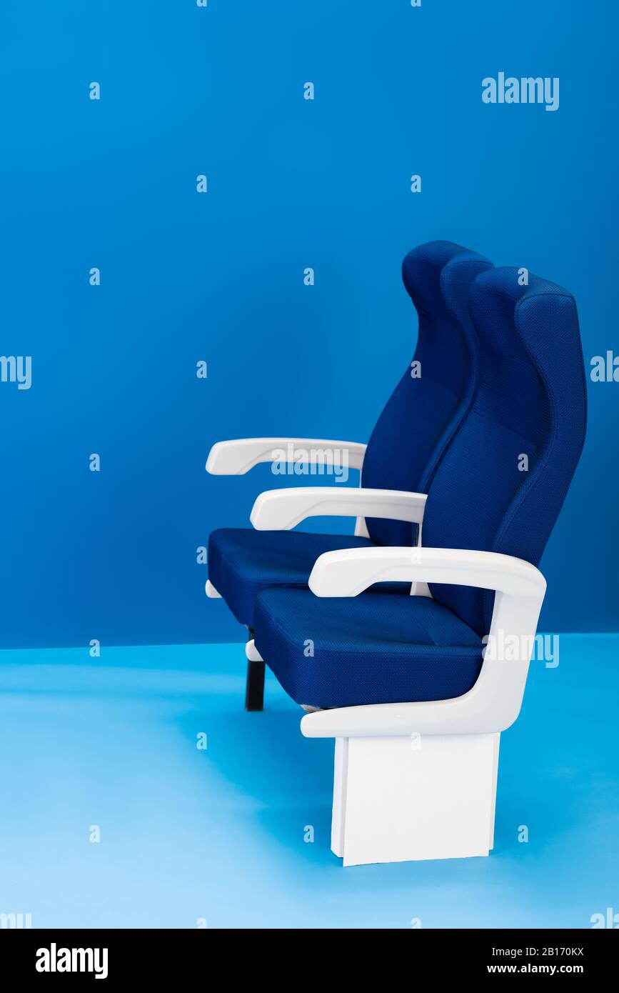 bright and colorful seats on blue background with copy space Stock ...