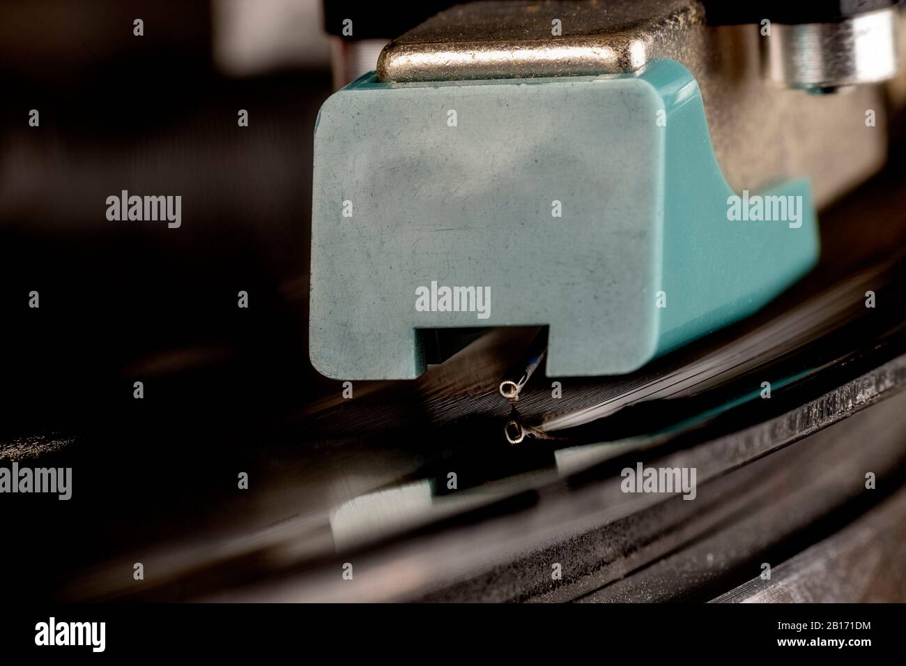 Turntable record needle macro riding in the groove Stock Photo - Alamy