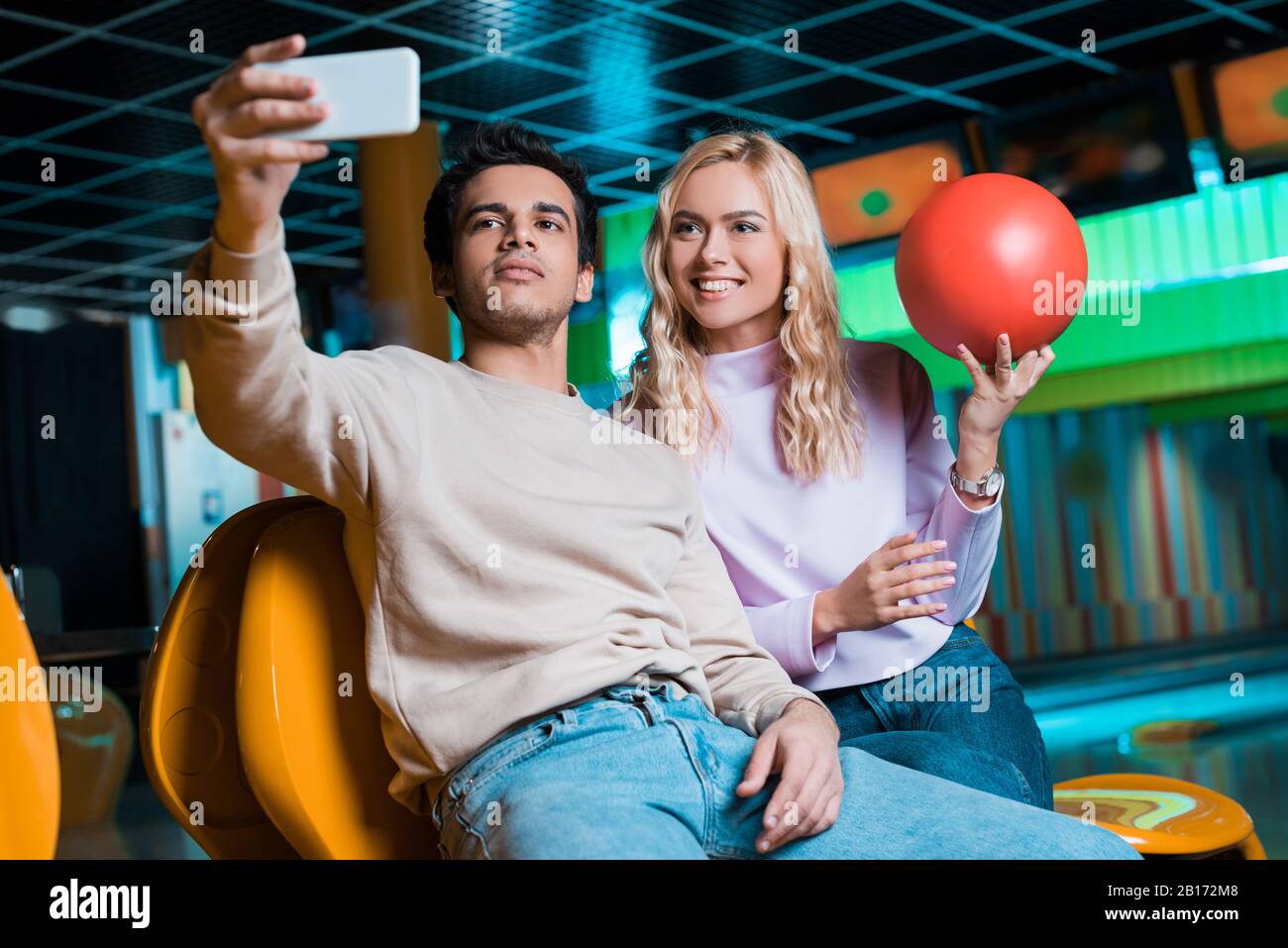Holding bowling ball hi-res stock photography and images - Alamy