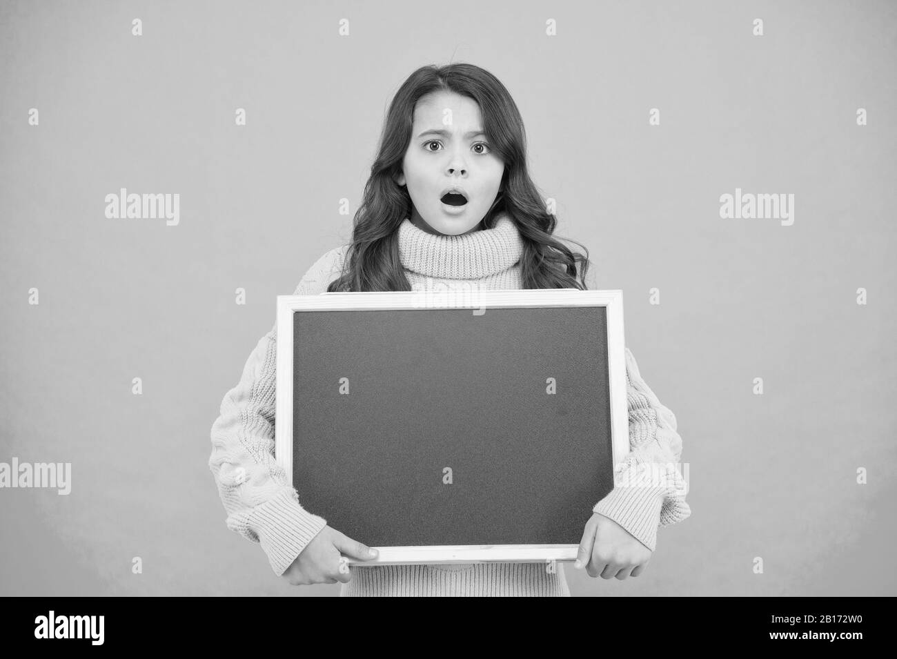 Notice information. Notification concept. Little girl hold blank ...