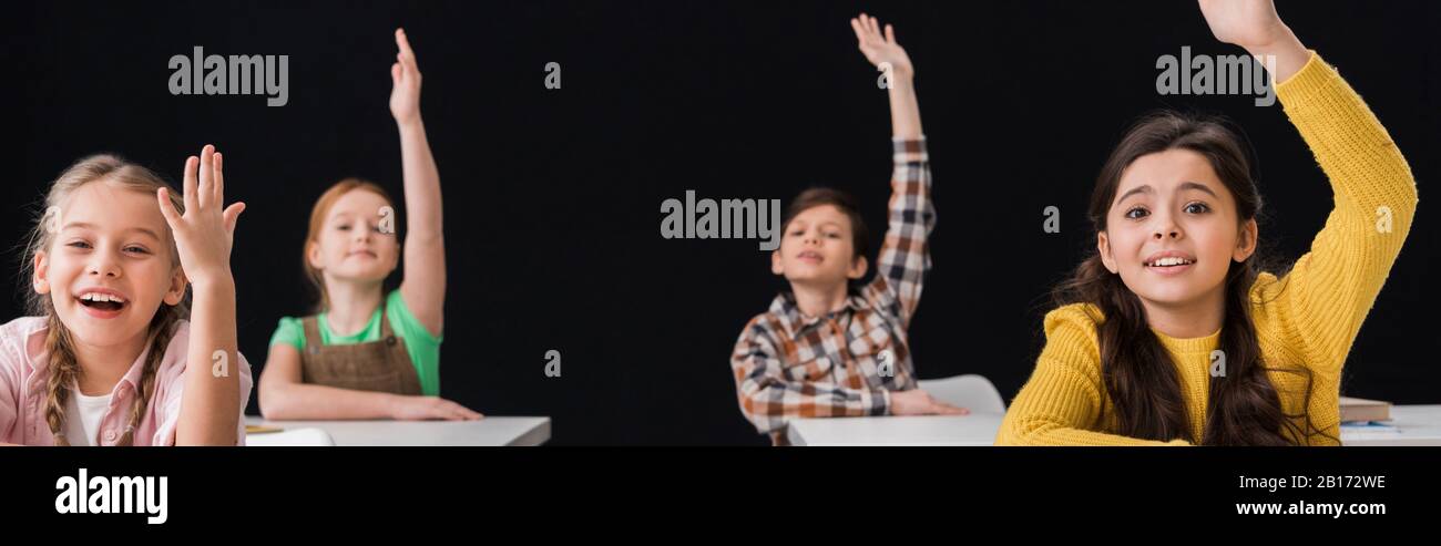 Children hands raised classroom hi-res stock photography and images - Alamy