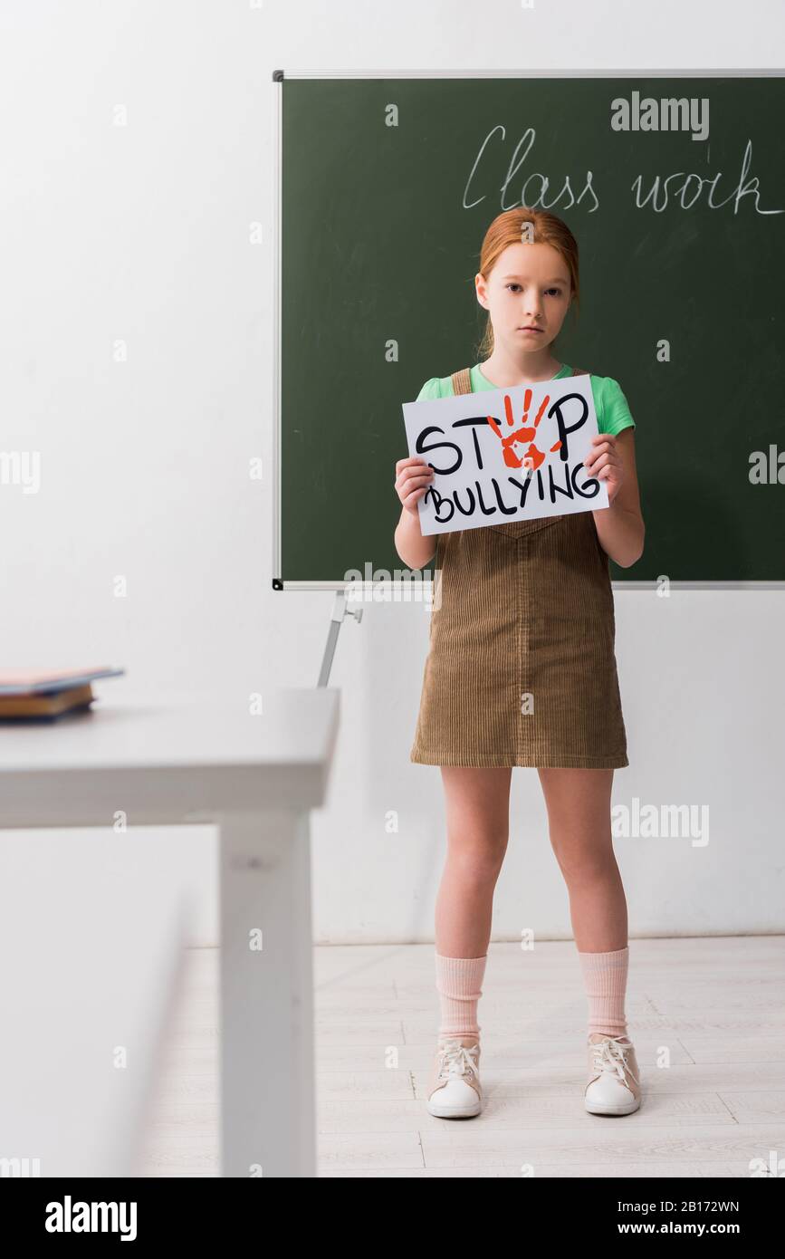 Kid holding placard hi-res stock photography and images - Alamy