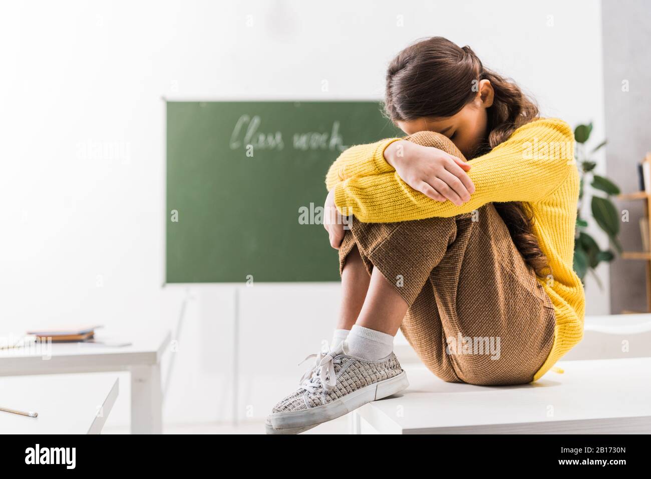 Schoolgirl crying hi-res stock photography and images - Alamy