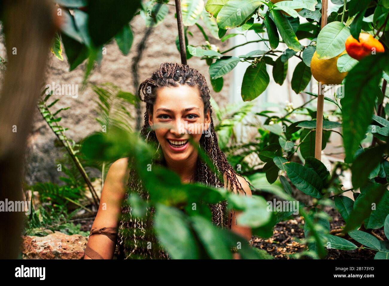 pretty islam woman in orange grove smiling, real muslim girl cheerful ...