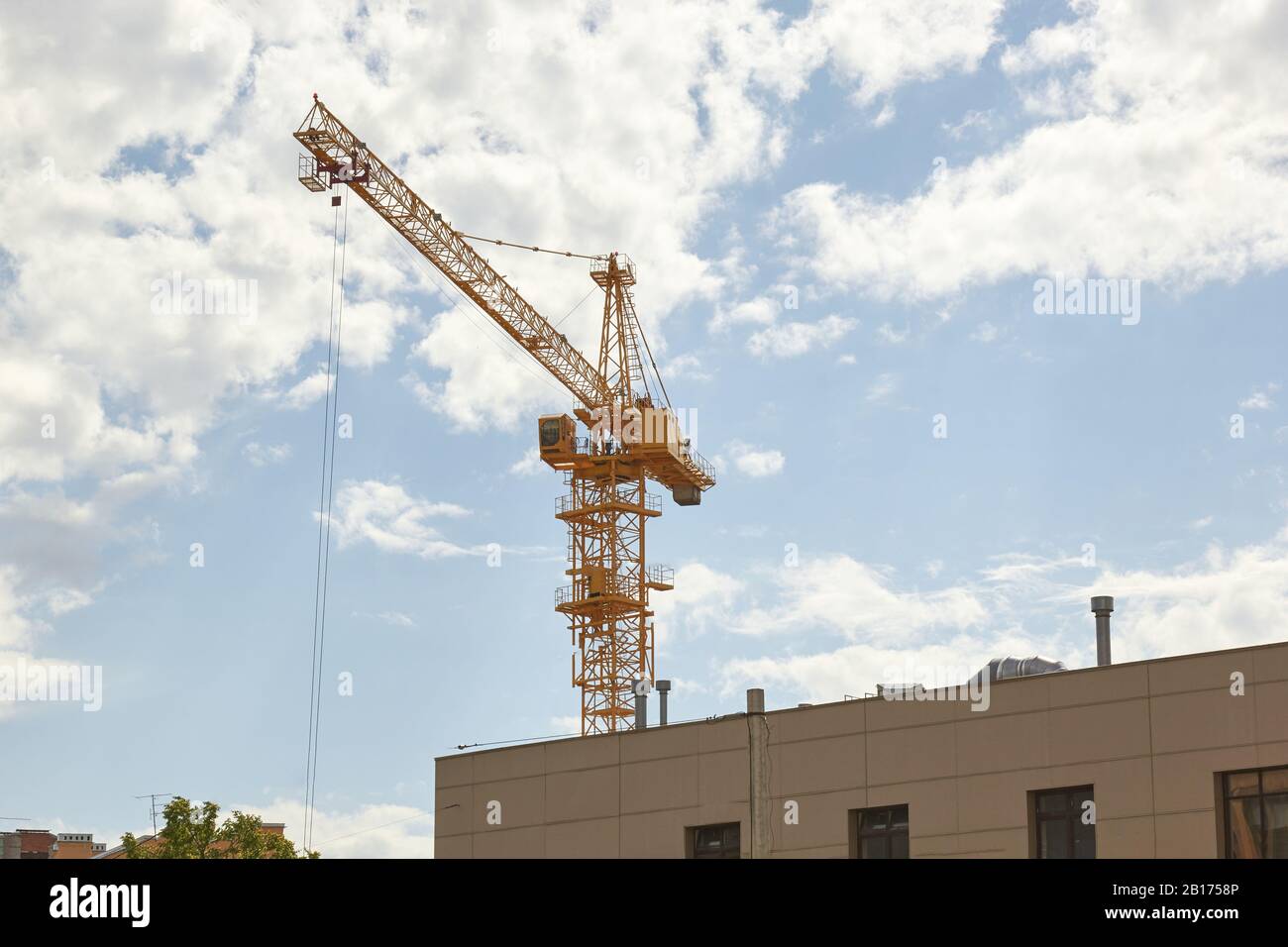 Industrial construction cranes the construction of an building Stock ...