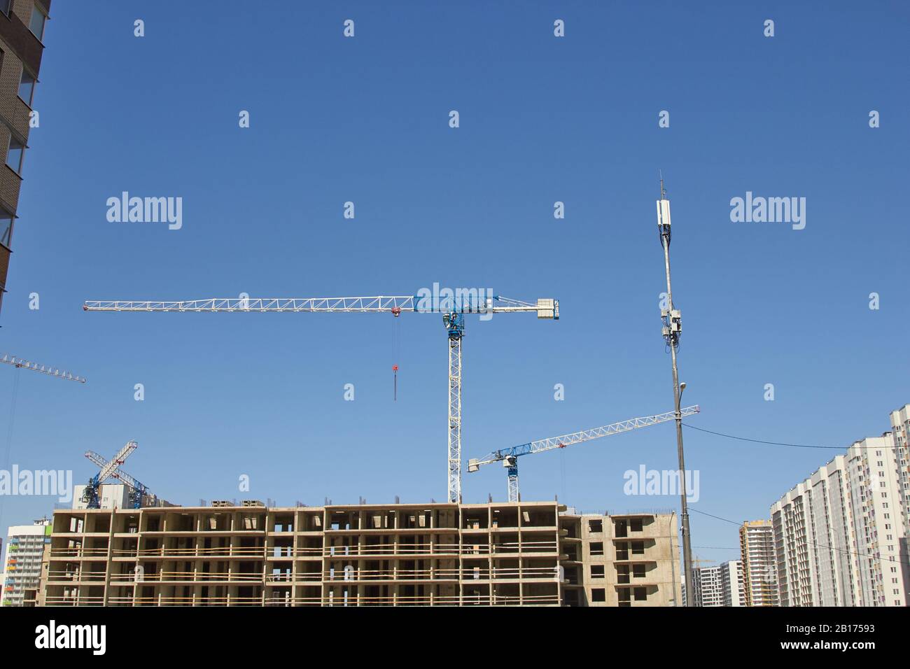 Industrial construction cranes the construction of an building Stock ...