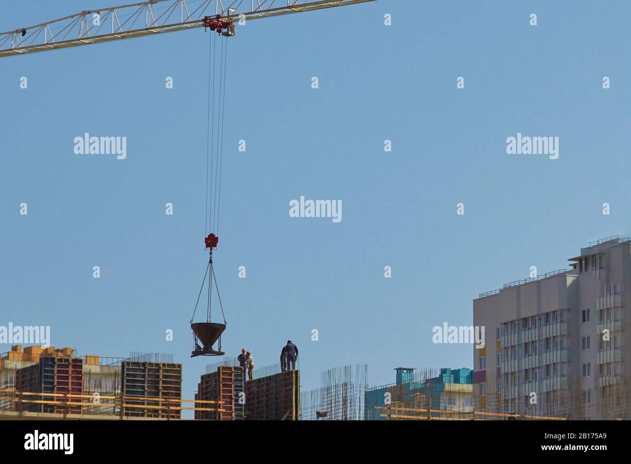 Industrial construction cranes the construction of an building Stock ...