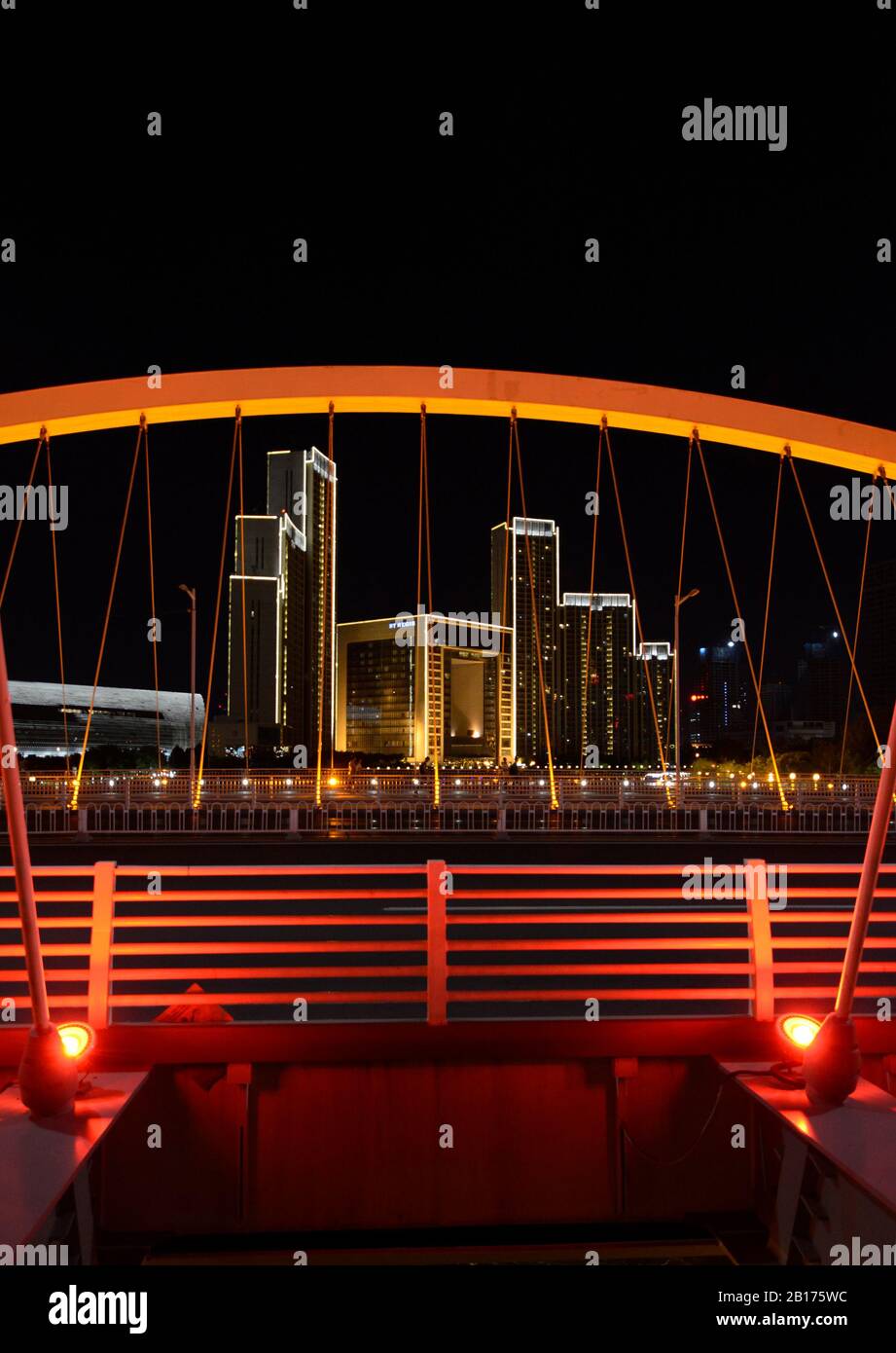 Hotel and residence complex seen through the Dagu bridge at night ...