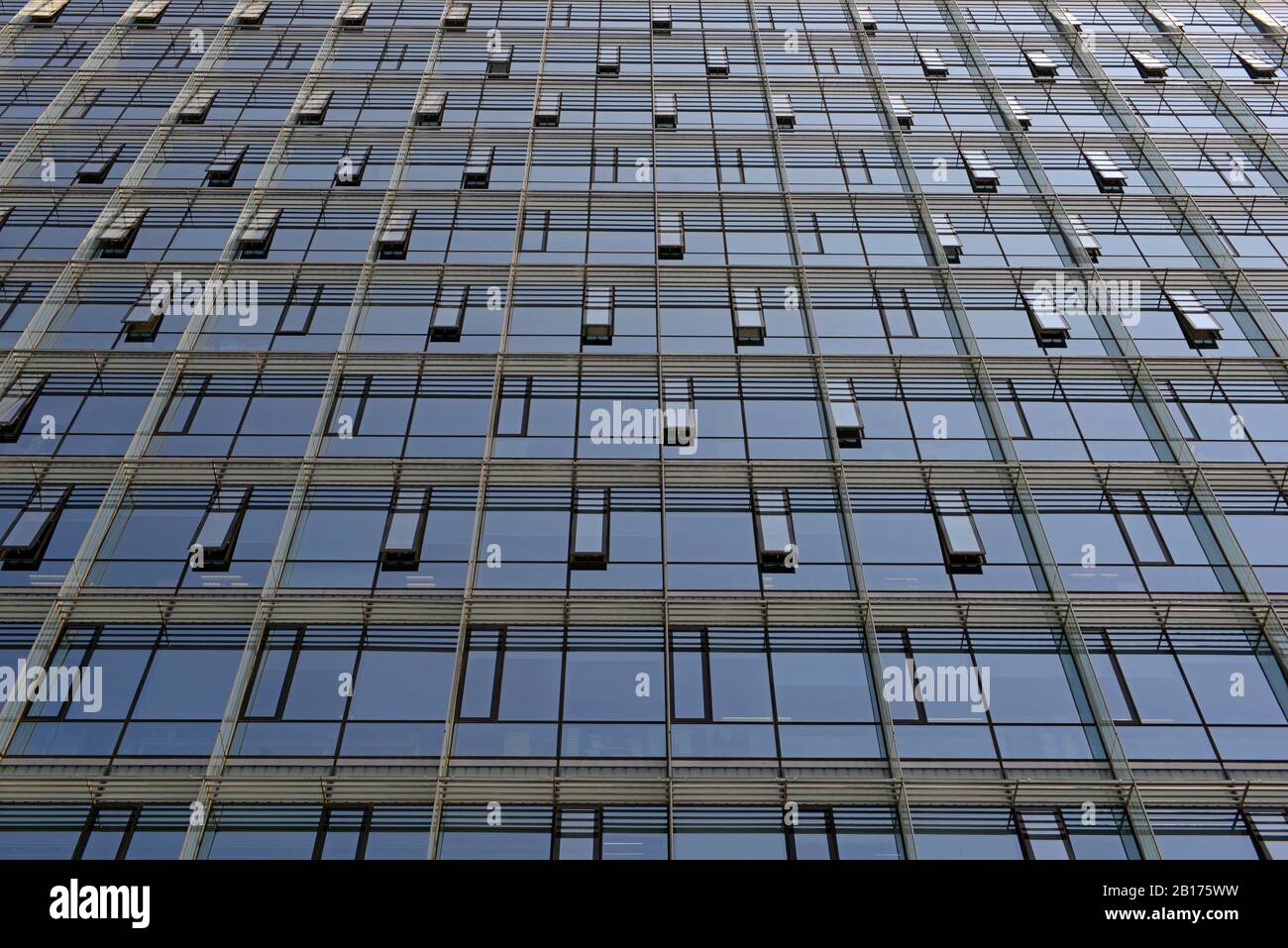 A pattern of open windows on a new office building in Wangjing district ...