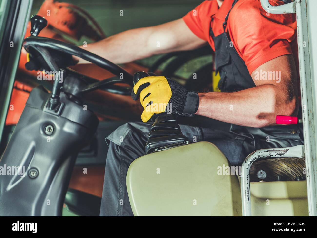 Caucasian Worker Operating Bulldozer. Closeup Photo. Heavy Construction ...