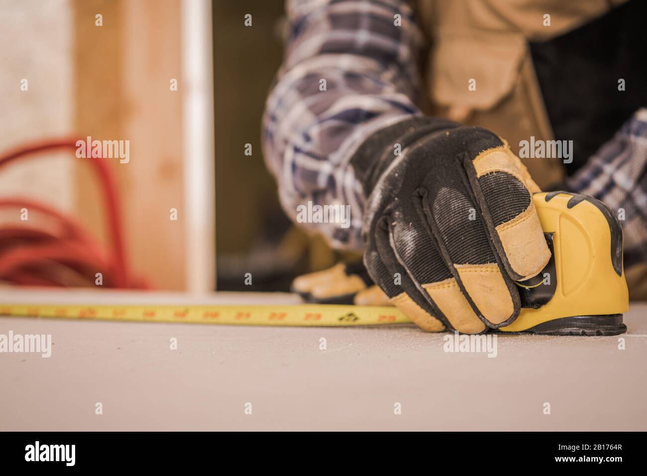 Sheetrock Drywall Measuring by Construction Worker. Closeup Industrial ...