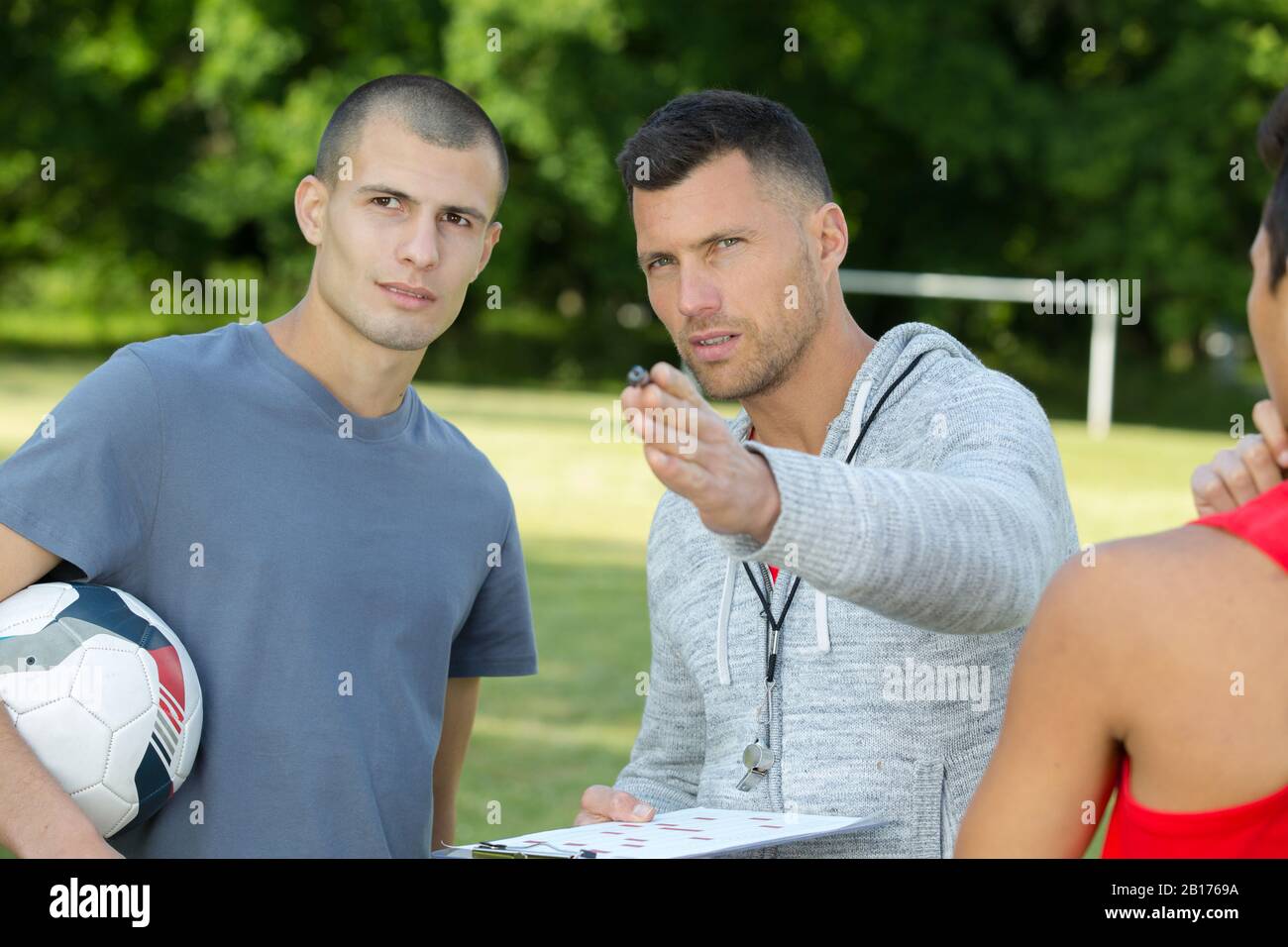 football team practicing on soccer pitch Stock Photo - Alamy