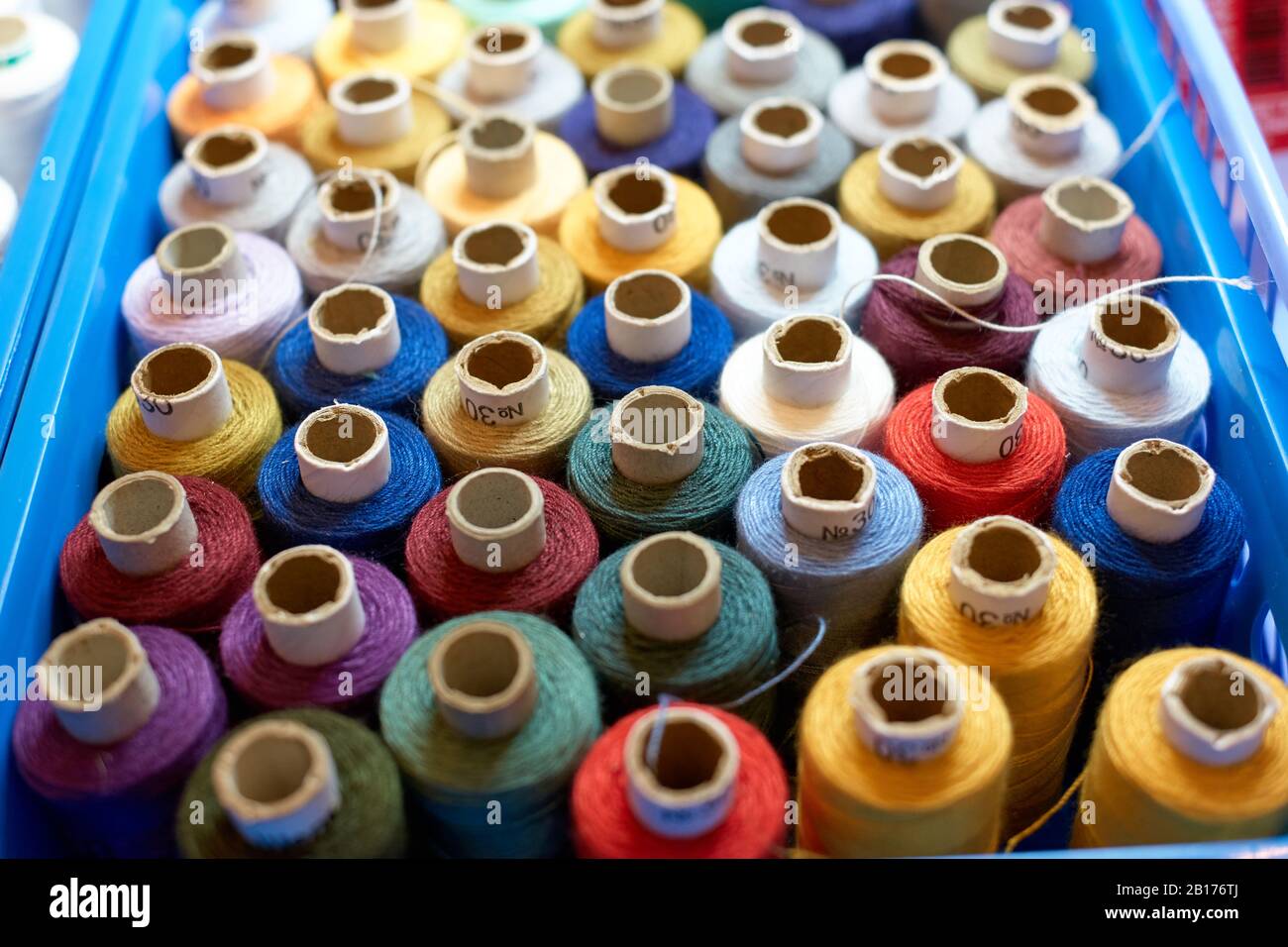 Set of colorful spools of thread Stock Photo - Alamy