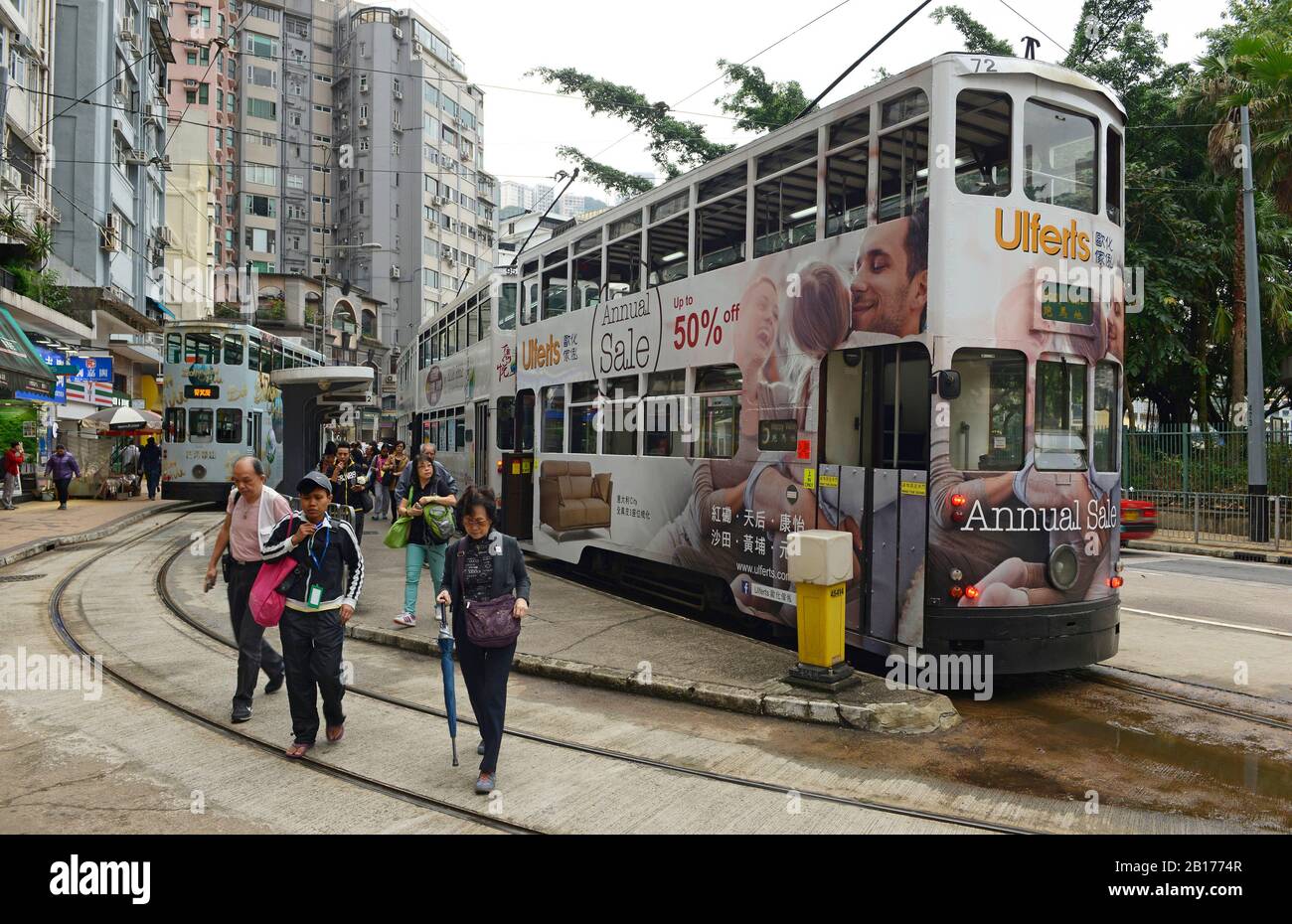 Passengers alight at Happy Valley Tram terminus, Hong Kong, China Stock ...