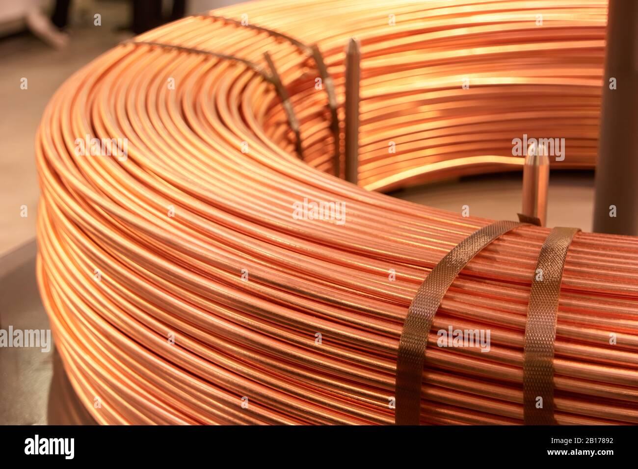 Bended fat curved copper cables Stock Photo - Alamy