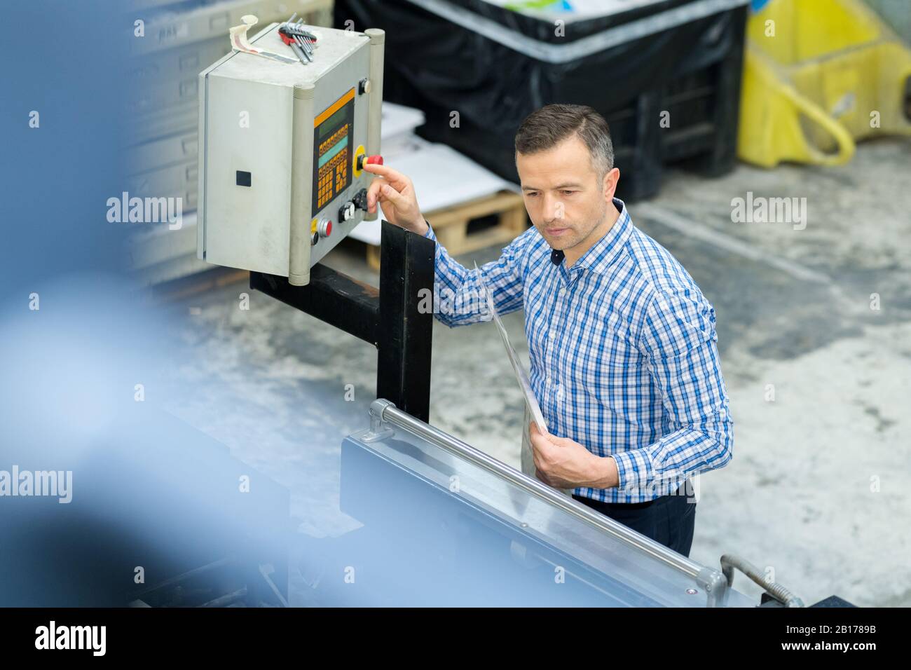 male machine operator Stock Photo - Alamy