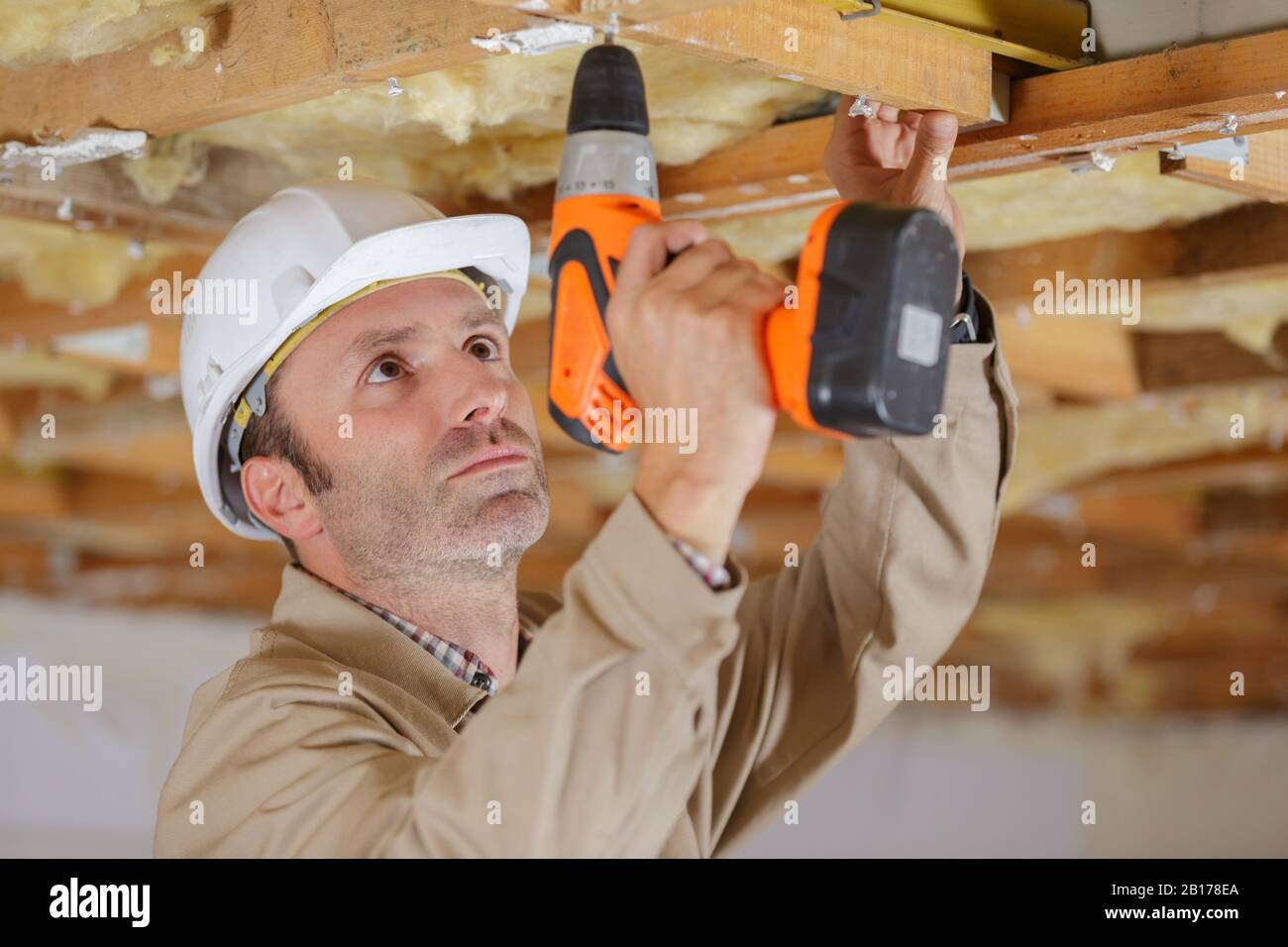 close up of a man with drill works Stock Photo - Alamy