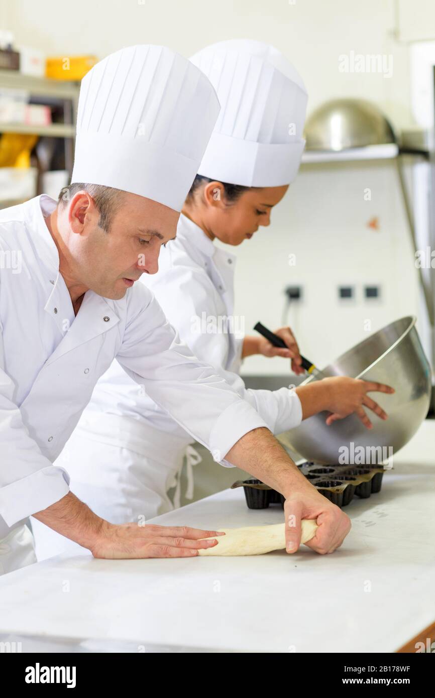 workers in a bakery shop Stock Photo - Alamy