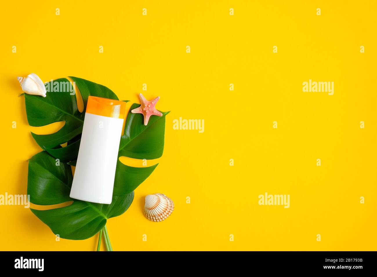 Blank sunscreen bottle mockup without labels, tropical leaves and ...