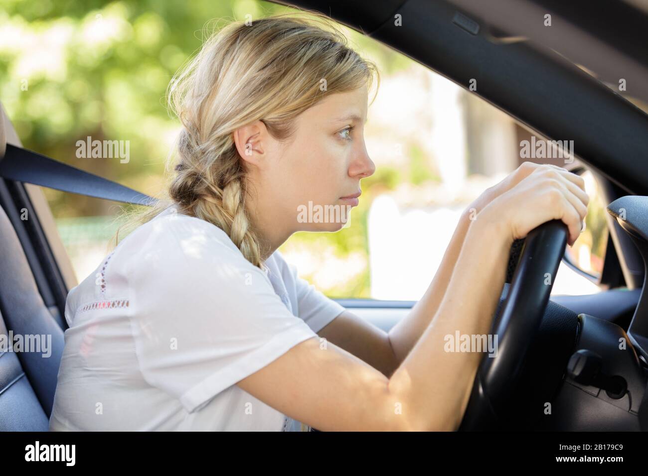 a tired female driver in traffic jams Stock Photo - Alamy