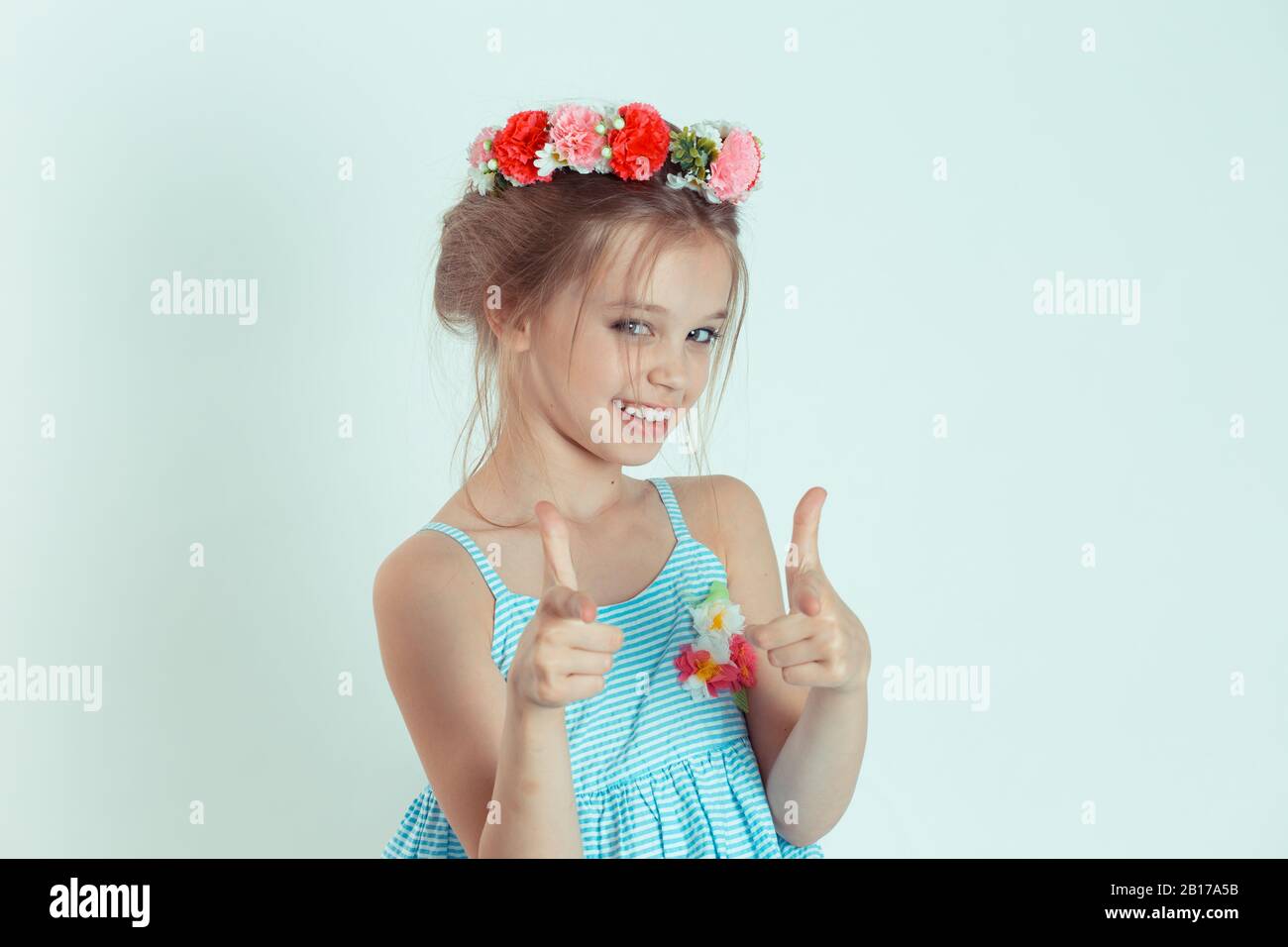 Hey you! Cute kid pretty girl pointing at camera, point index fingers ...