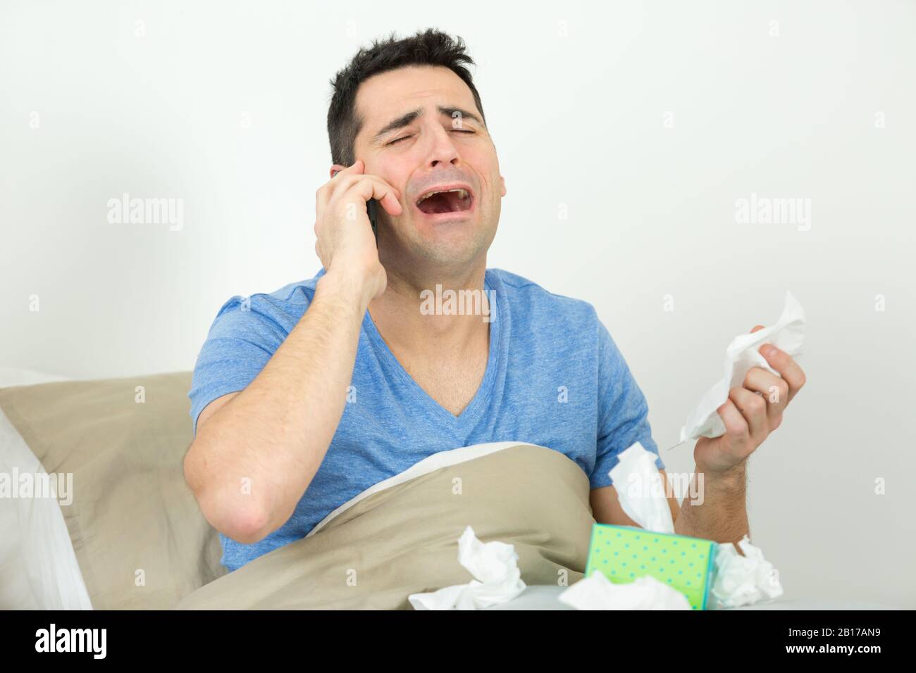 sad man sobbing at home Stock Photo - Alamy