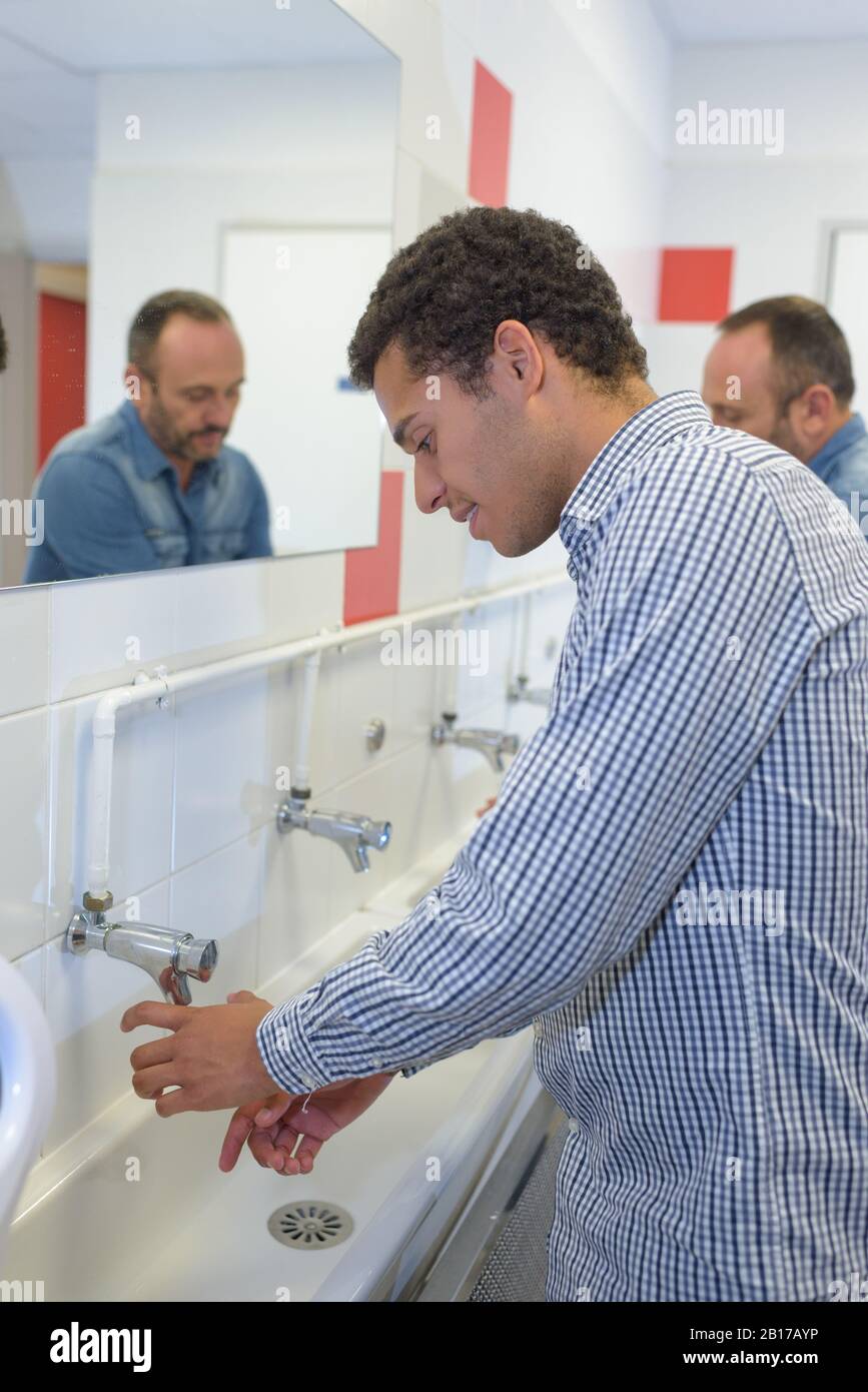 Mens washroom hi-res stock photography and images - Alamy