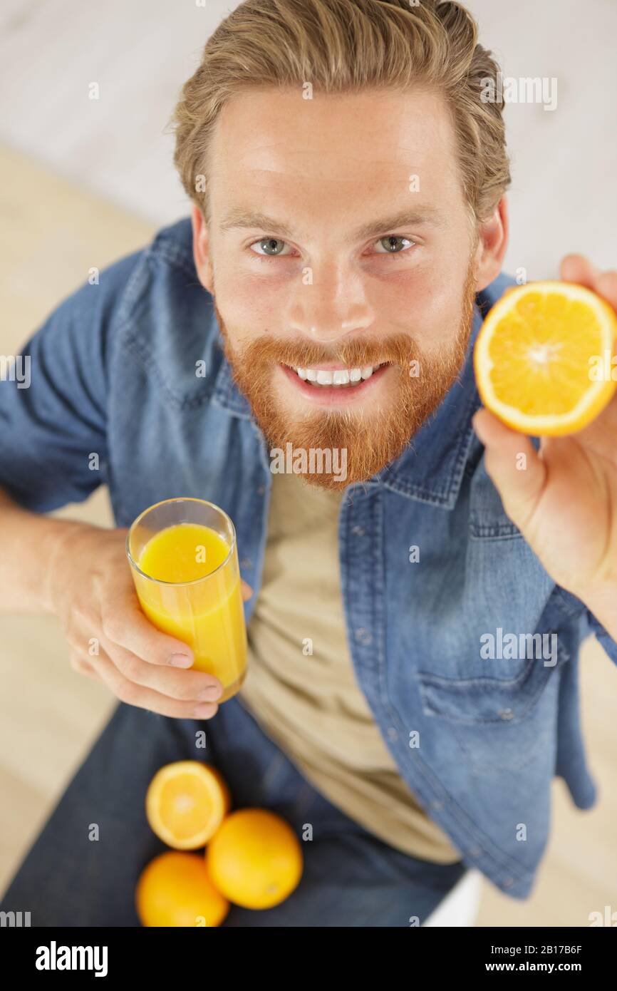 Man drinking orange juice isolated hi-res stock photography and images ...