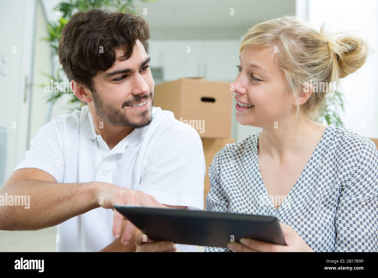 Couple moved in using hi-res stock photography and images - Alamy