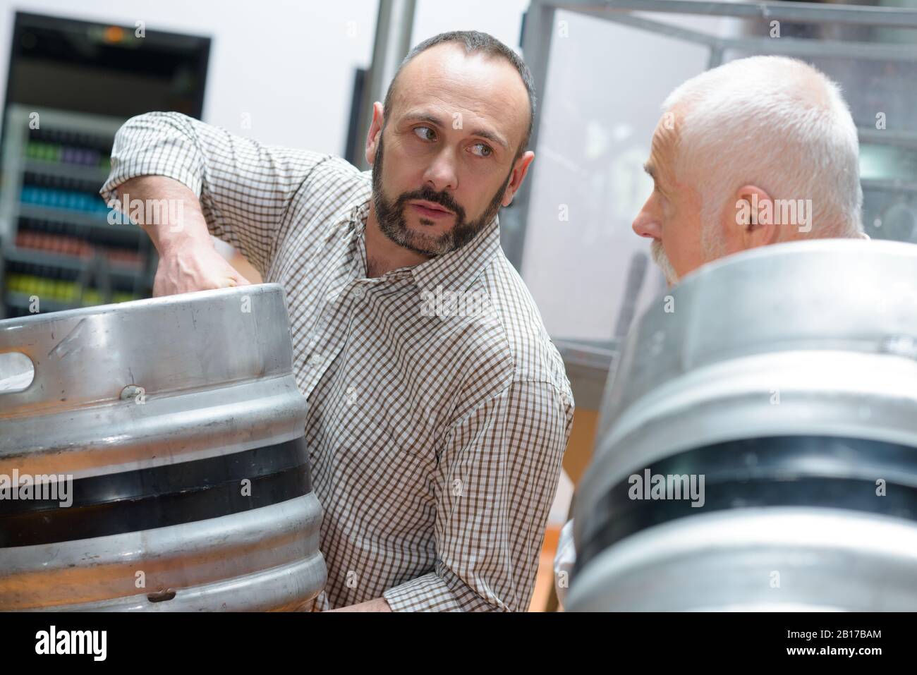Man Carrying Beer Barrel In High Resolution Stock Photography and ...
