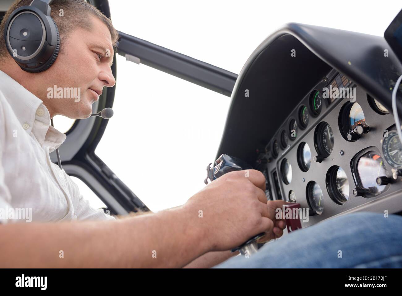 man in cockpit of aircraft Stock Photo - Alamy